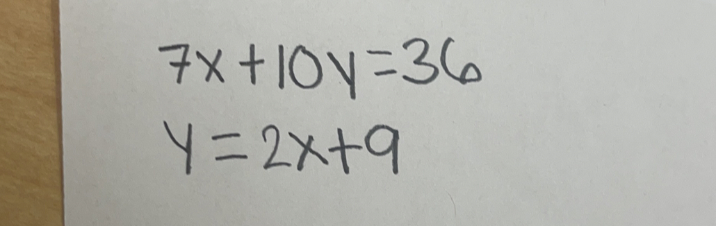 Solved: 7x+10y=36 y=2x+9 [Math]
