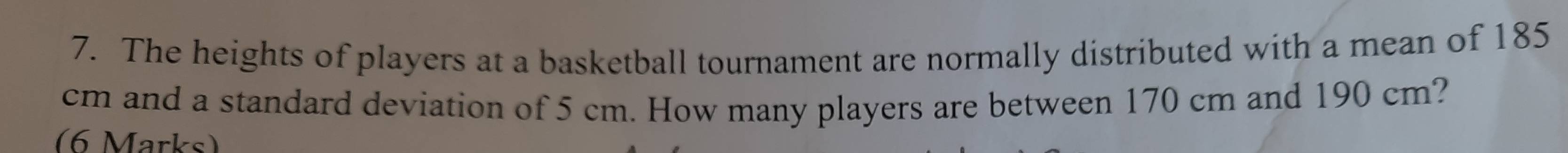 Solved: The heights of players at a basketball tournament are normally ...