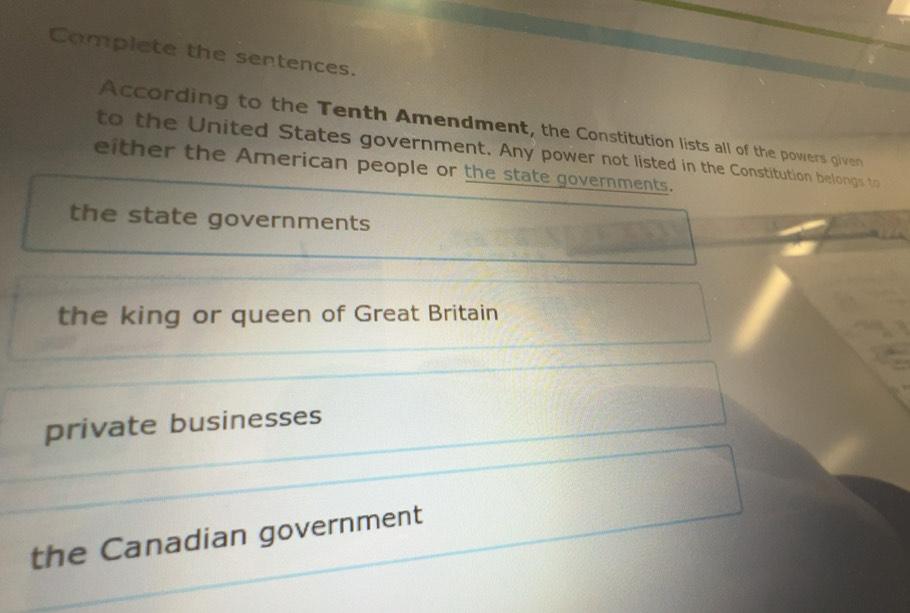 Gelöst:Complete the sentences. According to the Tenth Amendment, the ...