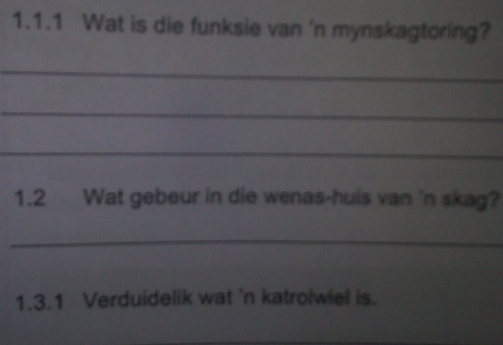 Solved: Wat is die funksie van 'n mynskagtoring? _ _ _ 1.2 Wat gebeur ...