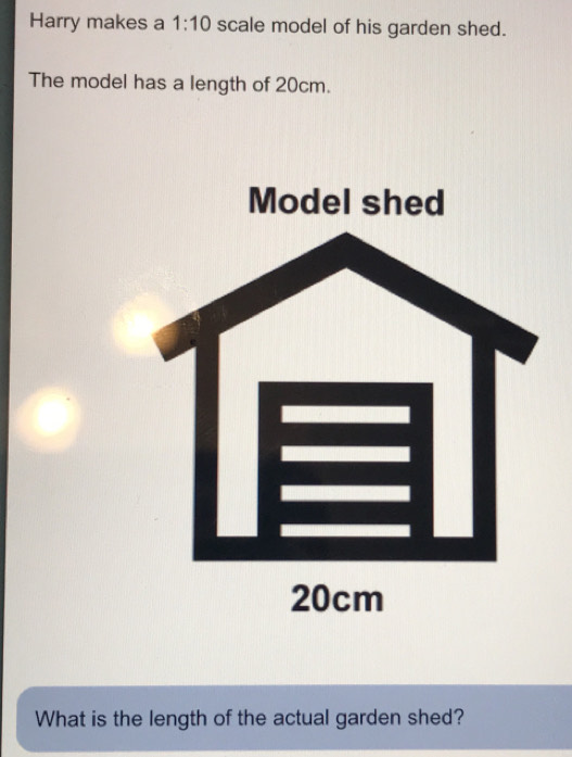 Solved: Harry makes a 1:10 scale model of his garden shed. The model ...
