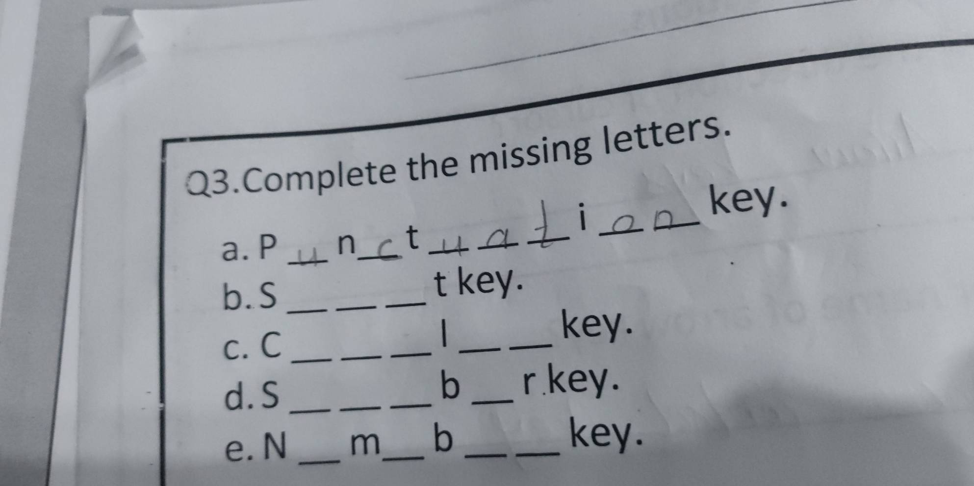 Solved: Q3.Complete the missing letters. _i key. a. P _n_ t_ _ _ b. S ...