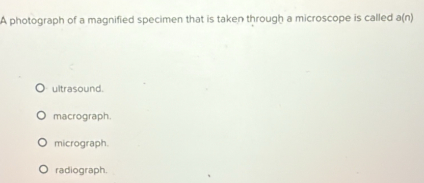 Solved: A photograph of a magnified specimen that is taken through a ...