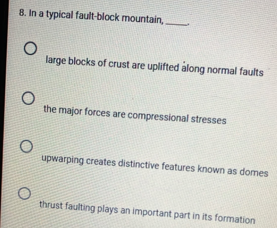 Solved: In a typical fault-block mountain,_ . large blocks of crust are ...
