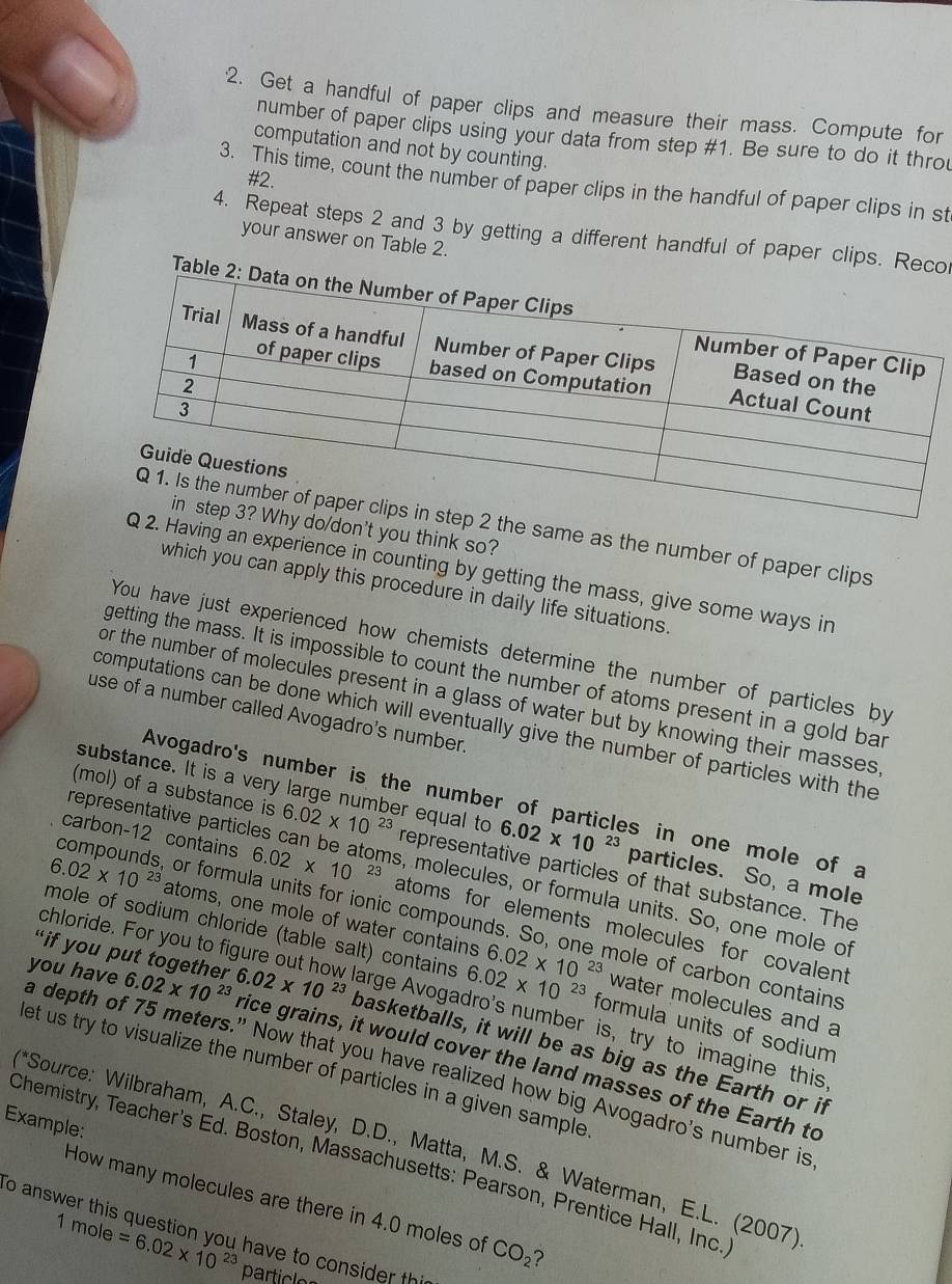 Solved: Get a handful of paper clips and measure their mass. Compute ...