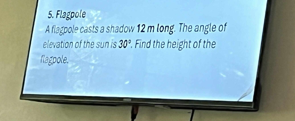 Solved: Flagpole A flagpole casts a shadow 12 m long. The angle of ...