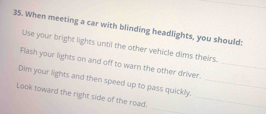 Solved: When meeting a car with blinding headlights, you should: Use ...