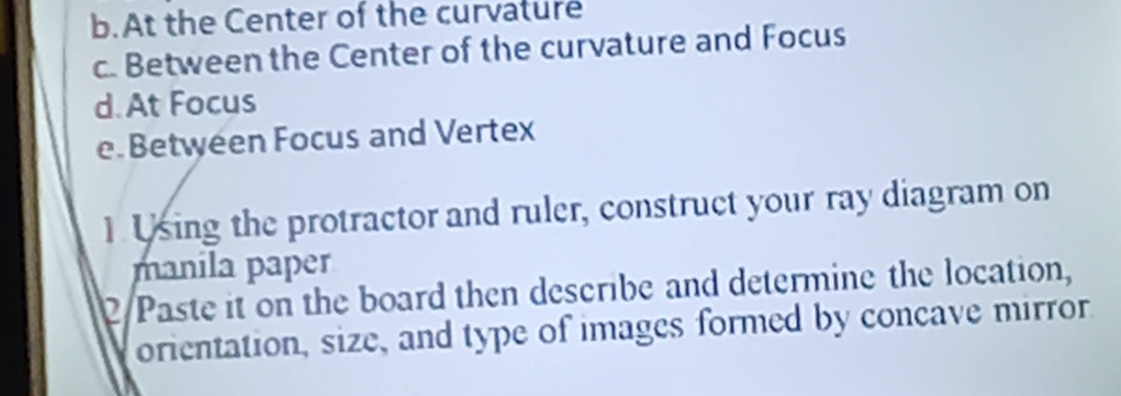 Solved: b.At the Center of the curvature c. Between the Center of the ...