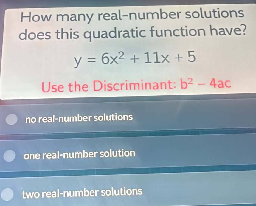 Solved: How many real-number solutions does this quadratic function have? y=6x^2+11x+5 Use the ...