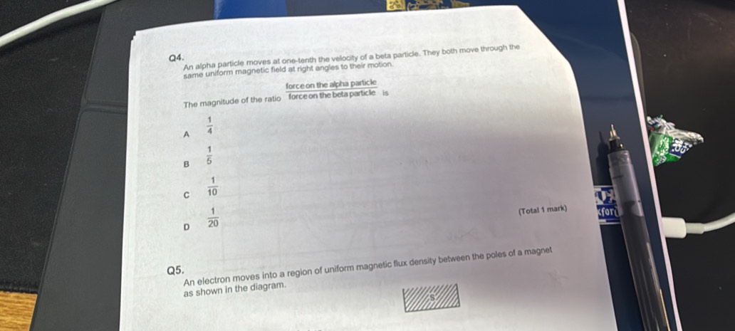 Solved: An alpha particle moves at one-tenth the velocity of a beta ...
