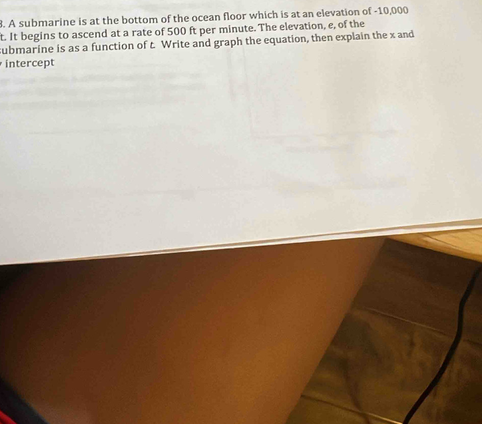 Solved: A submarine is at the bottom of the ocean floor which is at an ...