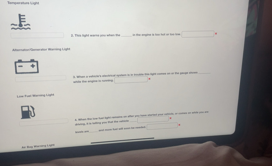 Solved: Temperature Light 2. This light warns you when the _in the ...