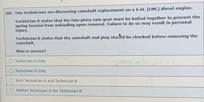 Solved: Two technicians are discussing camshaft replacement on a 6.6L ...