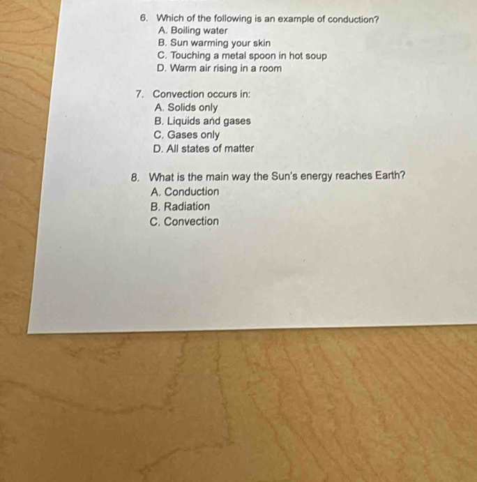 Solved: Which of the following is an example of conduction? A. Boiling ...