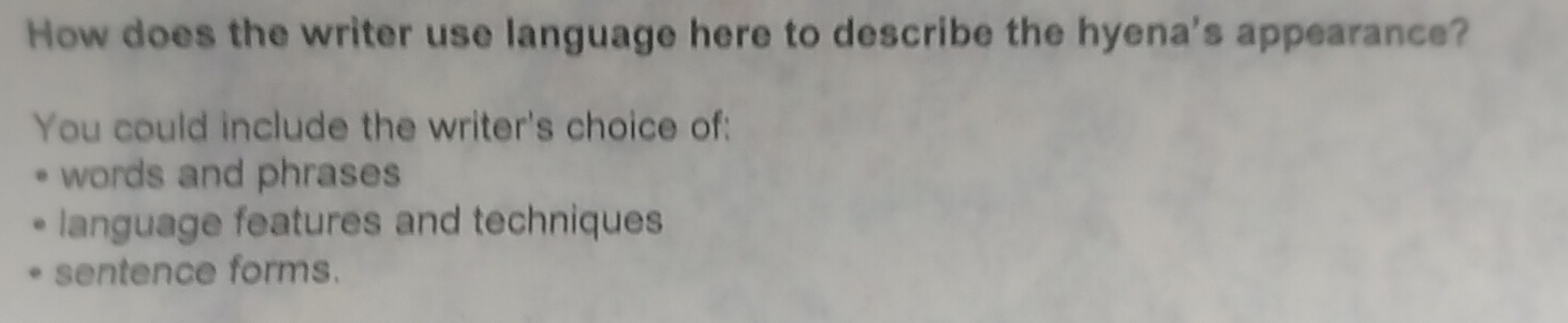 Gelöst:How does the writer use language here to describe the hyena's ...