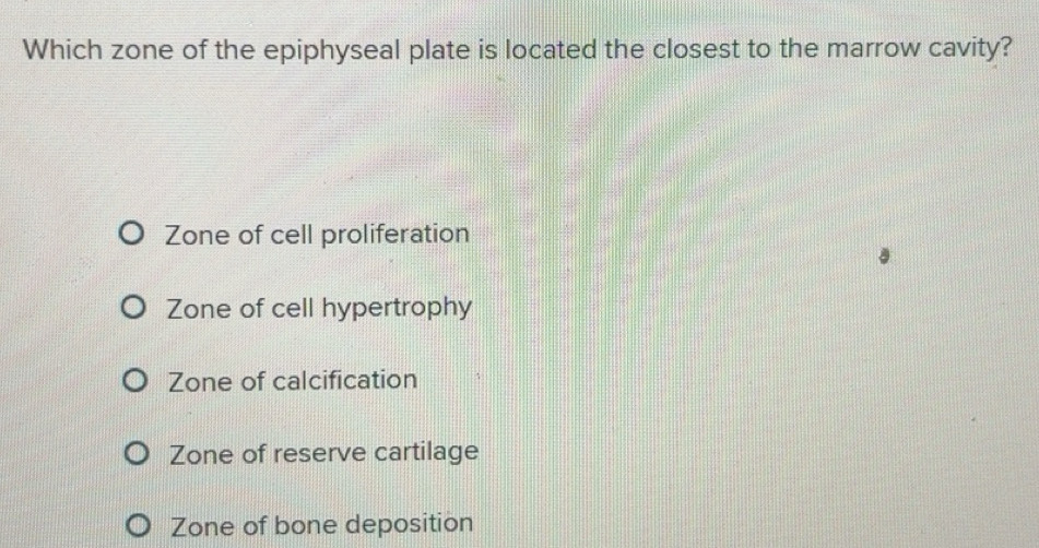 Solved: Which zone of the epiphyseal plate is located the closest to ...