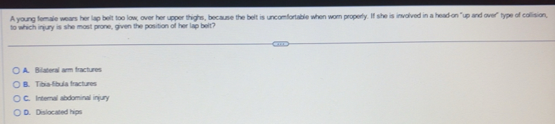 Solved: A young female wears her lap belt too low, over her upper ...