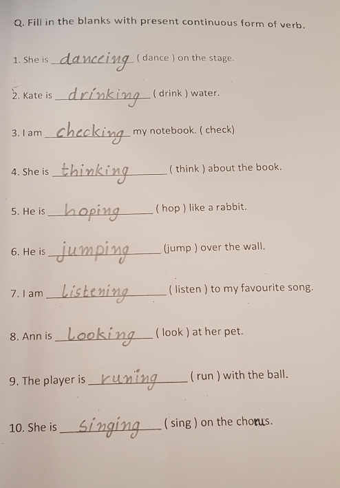 Solved: Fill in the blanks with present continuous form of verb. 1. She ...