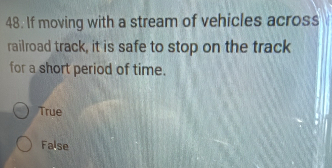 Solved: If moving with a stream of vehicles across railroad track, it ...