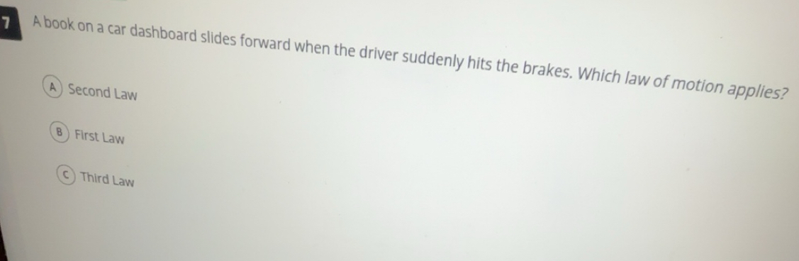 Solved: A book on a car dashboard slides forward when the driver ...