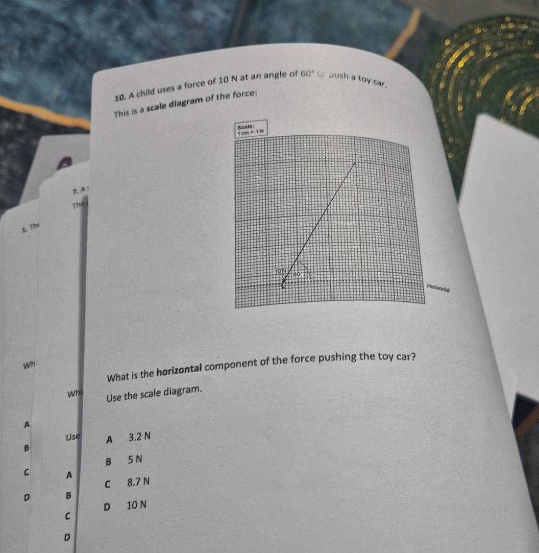 Solved: A child uses a force of 10 N at an angle of 60° to push a toy ...