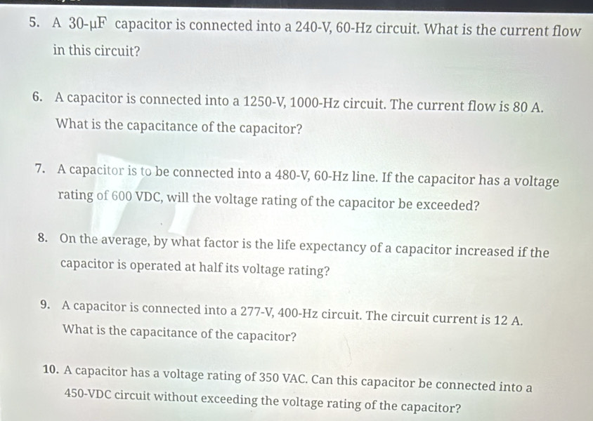 Solved: A 30-µF capacitor is connected into a 240-V, 60-Hz circuit ...