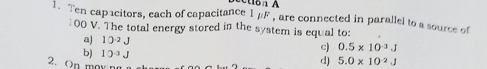 Solved: oction A 1. Ten capacitors, each of capacitance 1 μF, are connected in parallel to a ...