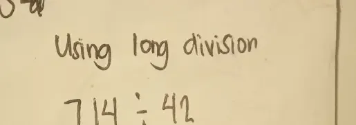 Solved: Using long division 714/ 42 [Math]