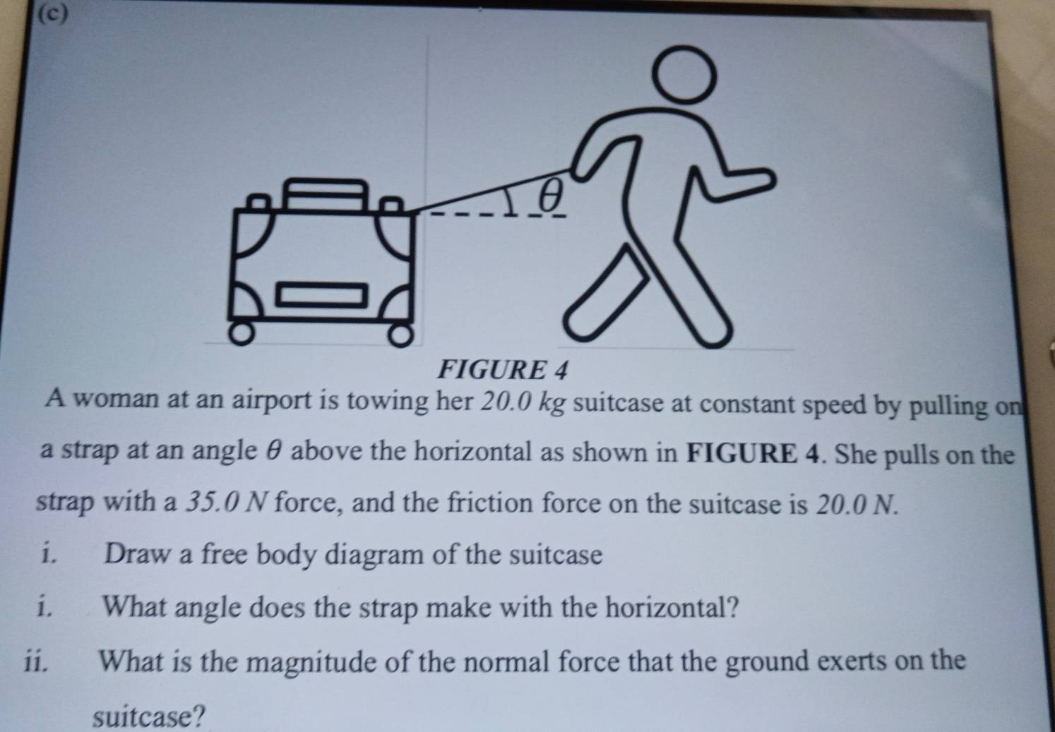 Selesai:FIGURE 4 A woman at an airport is towing her 20.0 kg suitcase ...