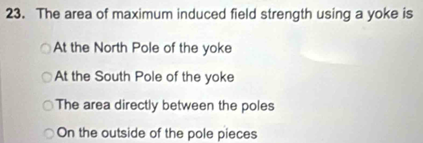 Solved: The area of maximum induced field strength using a yoke is At ...